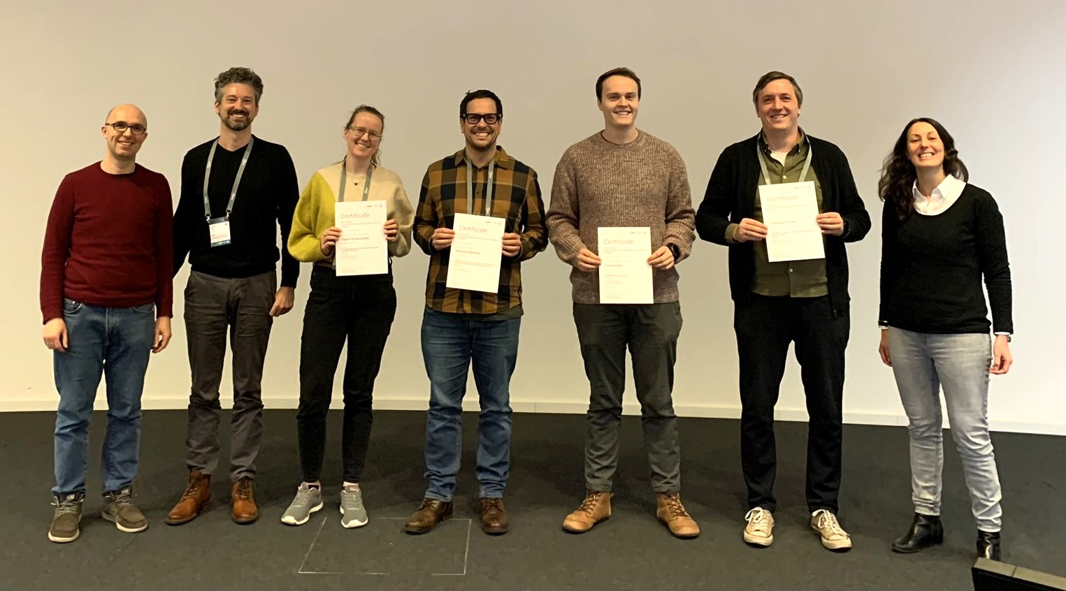 Poster prize winners together with the Scientific Organisers of the ...