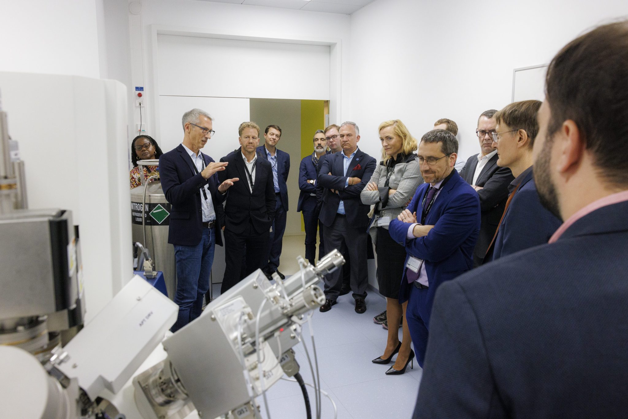 Jan Ellenberg gives a tour of the EMBL IC to the participants of the ...